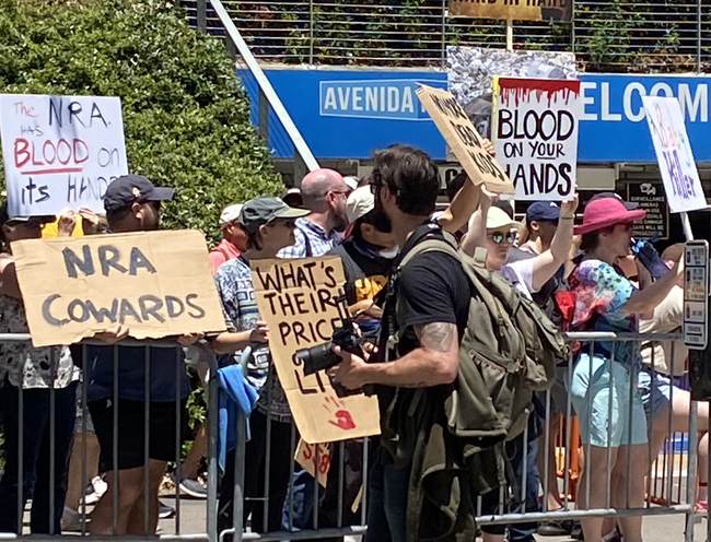 An up close (and birds-eye) look at the protests of the NRA's Annual ...