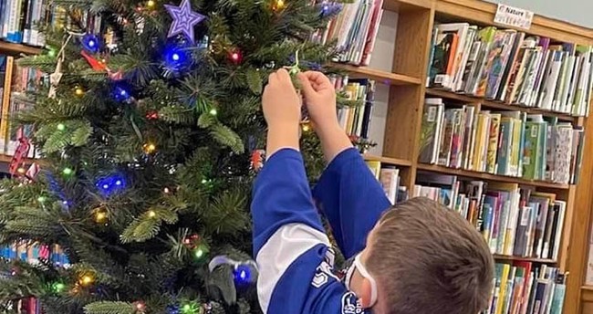 A small town library's Christmas tree became the focus of woke outrage ...