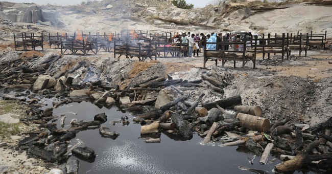 Scores of Bodies Dumped in Ganges River as India's COVID Crisis Worsens ...
